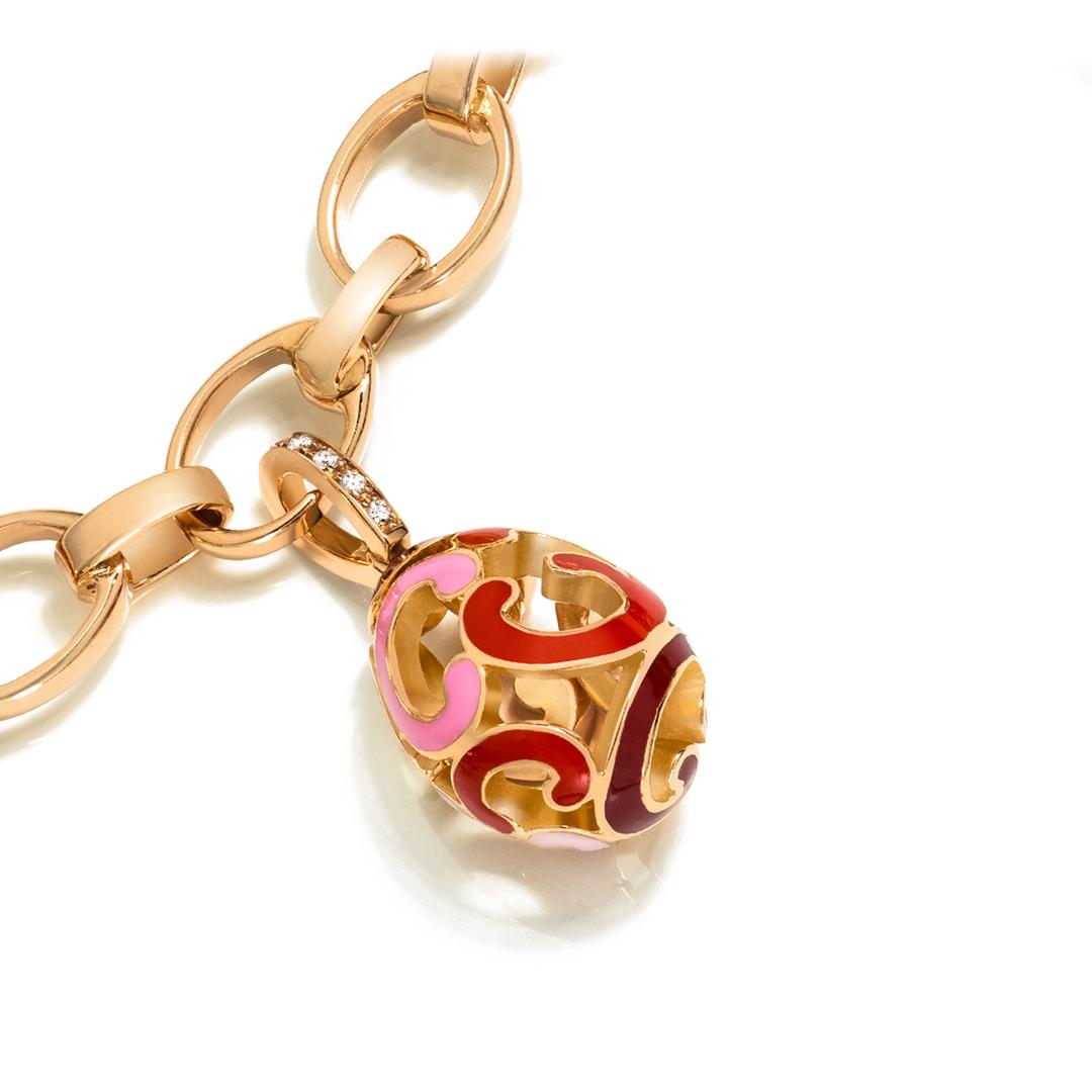 Rococo rose gold lacquered charm egg | Fabergé | The Jewellery Editor